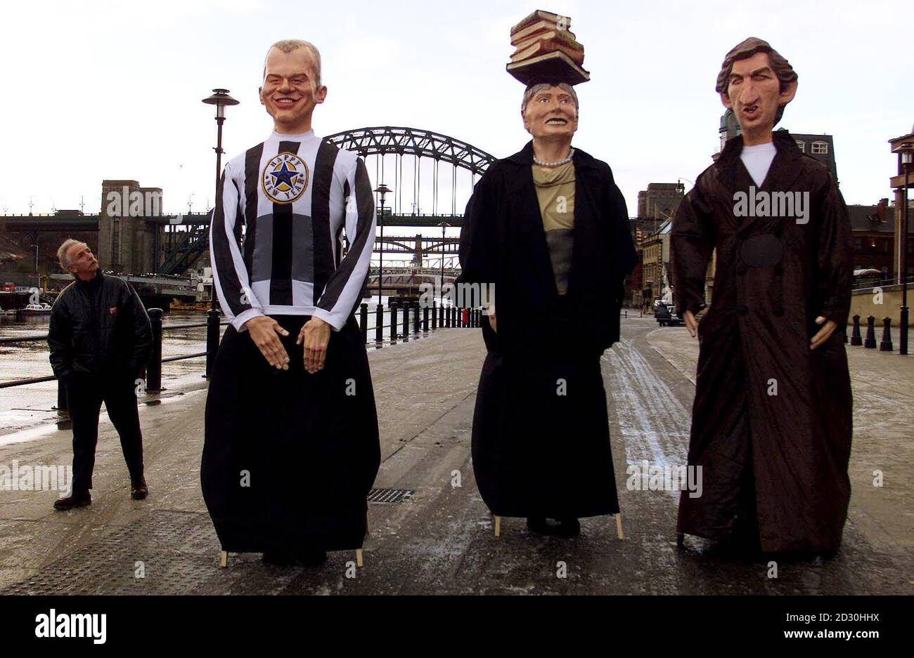 Sculpter Ozzie Riley puts the finishing touches to three of his ...