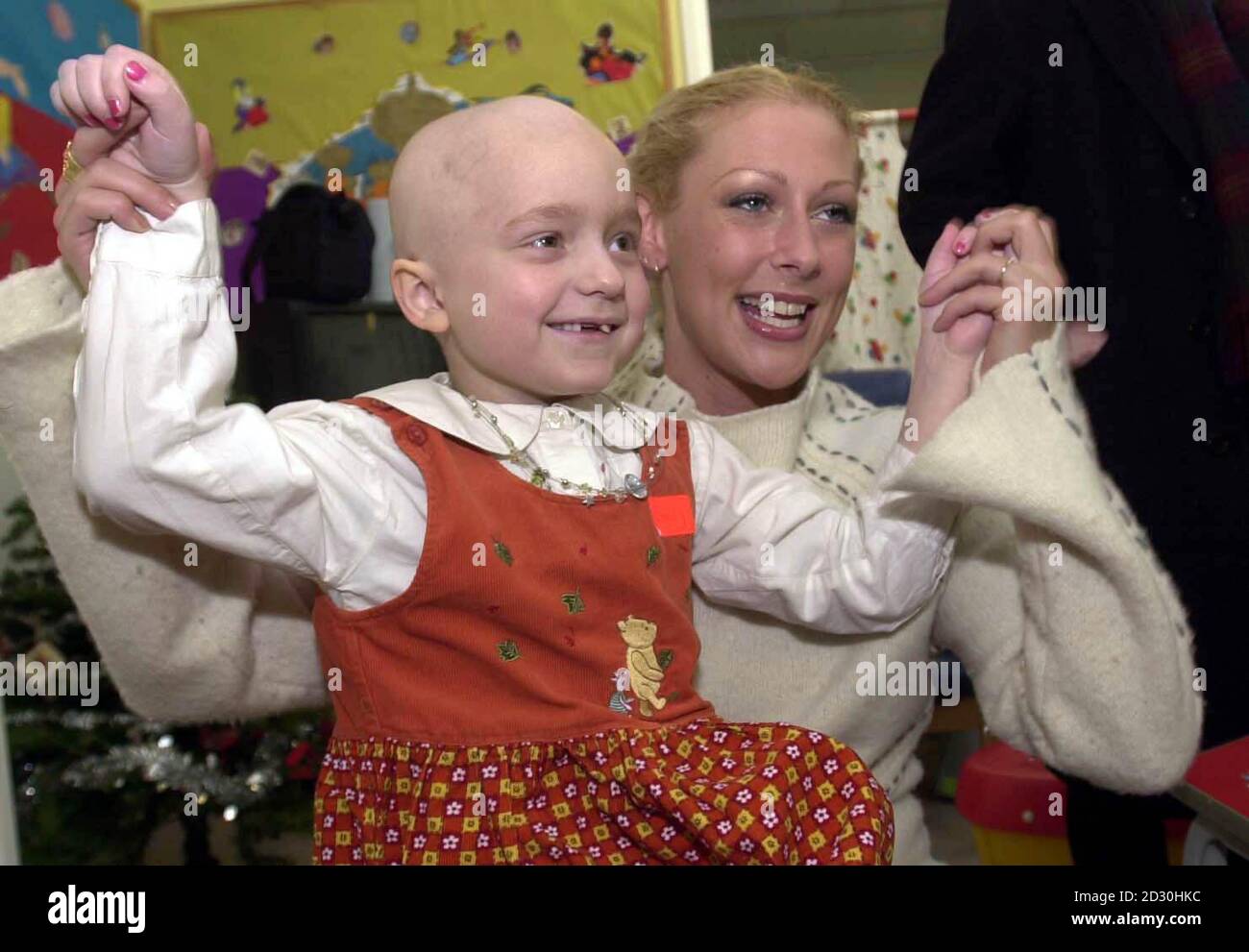 Faye Tozer from the pop group Steps with 5-year-old Emily Bowden, a ...