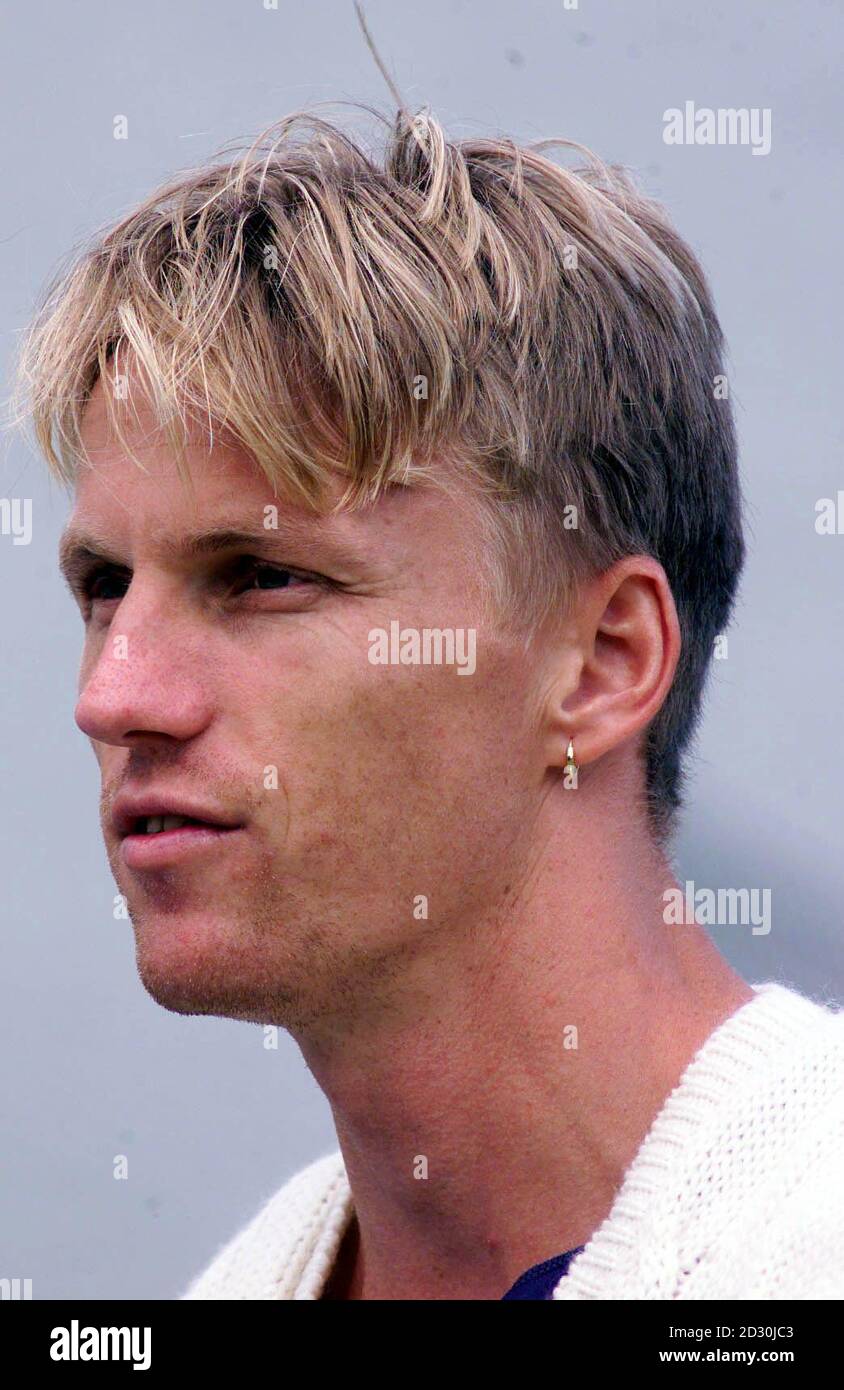 England cricketer Alan Mullally sporting an earring, at net practice at ...