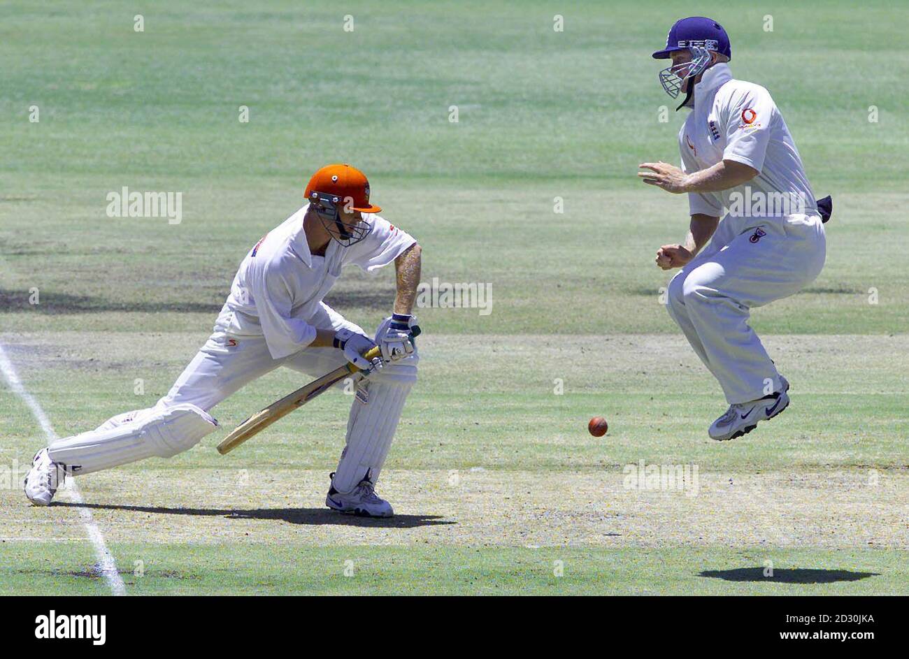 England's Darren Maddy leaps to avoid the ball off the bat of James ...