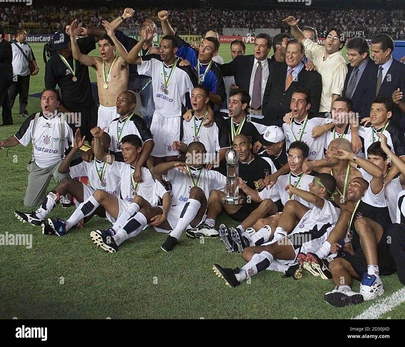 The jubilant corinthian team celebrate hi-res stock photography and ...