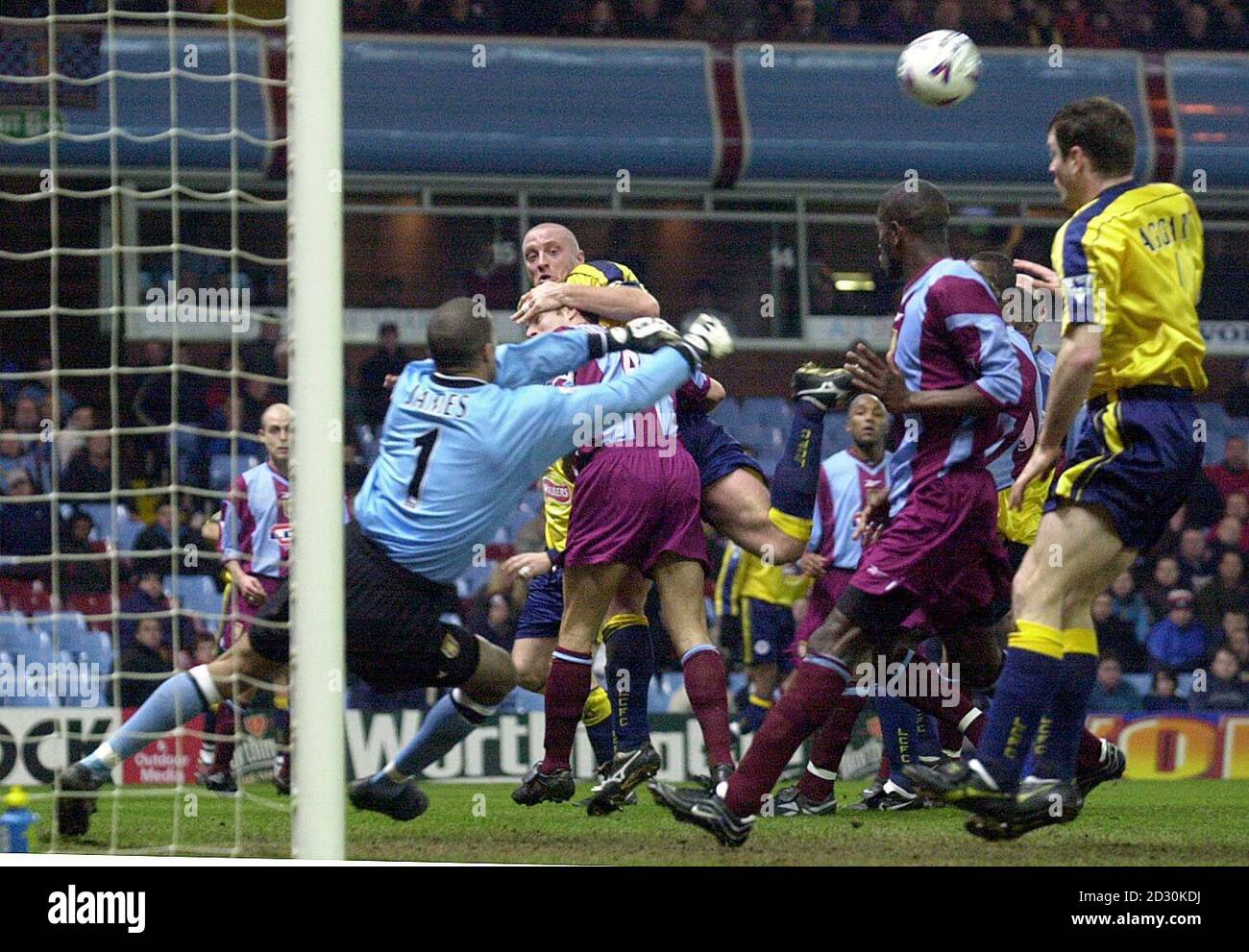 Goalkeeper punching ball hi-res stock photography and images - Alamy