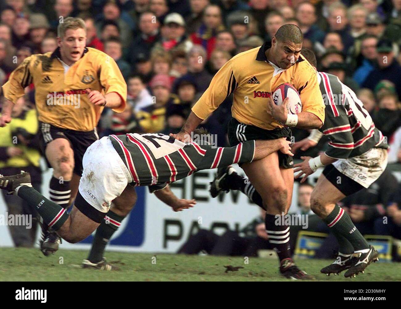 Leicester's Pat Howard tries to stop Newcastle's Inga Tuigamala during ...