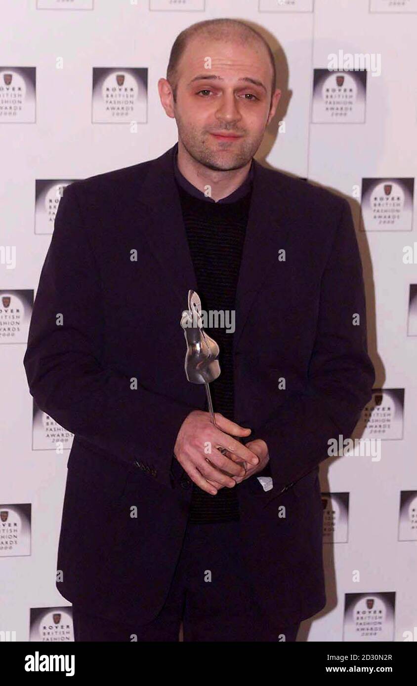 Hussein Chalayan with his award for British Designer of The Year at the ...
