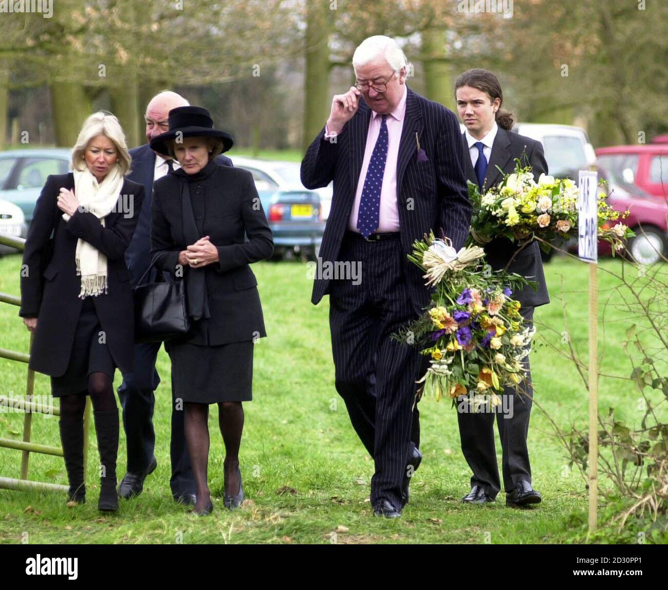 Nicholas Colvin (second Left) arriving the funeral of his brother ...