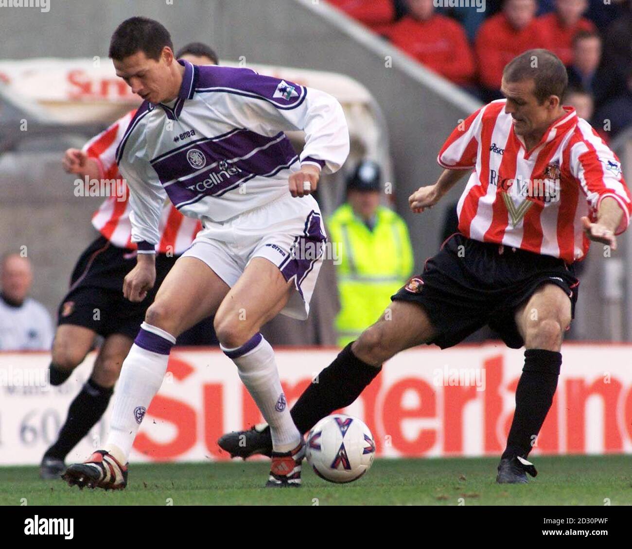 Sport football action tackling alex rae hi-res stock photography and ...