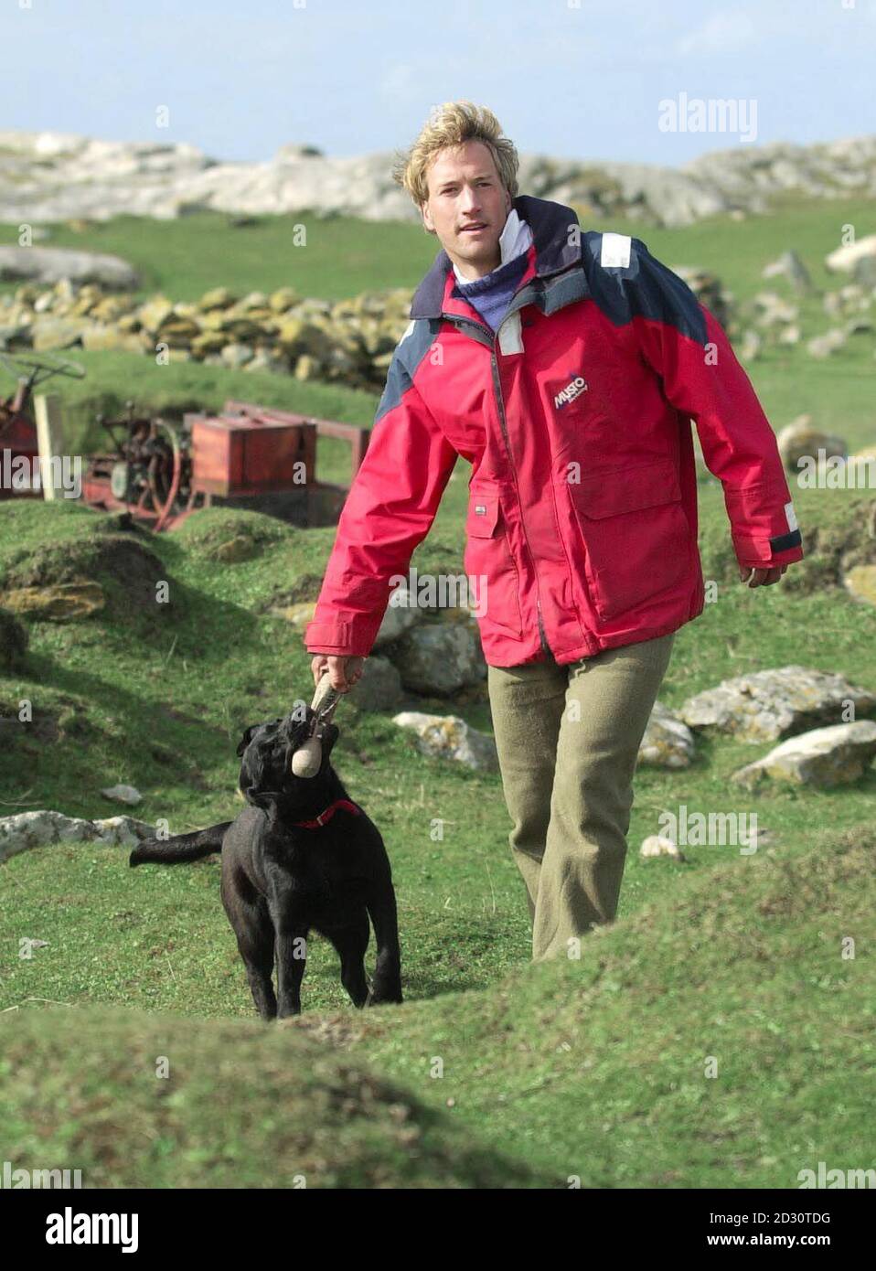 Castaway Benjamin Fogle takes his dog for a walk on the island of ...