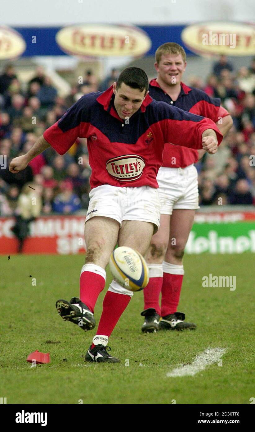 Llanelli's outside half Stephen Jones adds to his tally against Cardiff ...