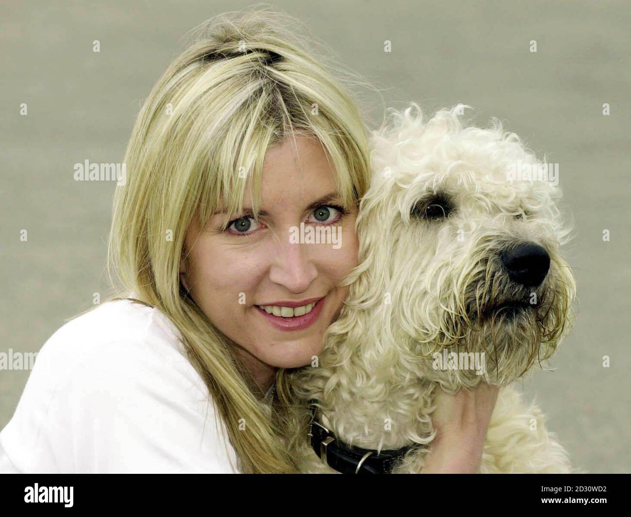 Popular model and animal lover Heather Mills, with her soft coated ...
