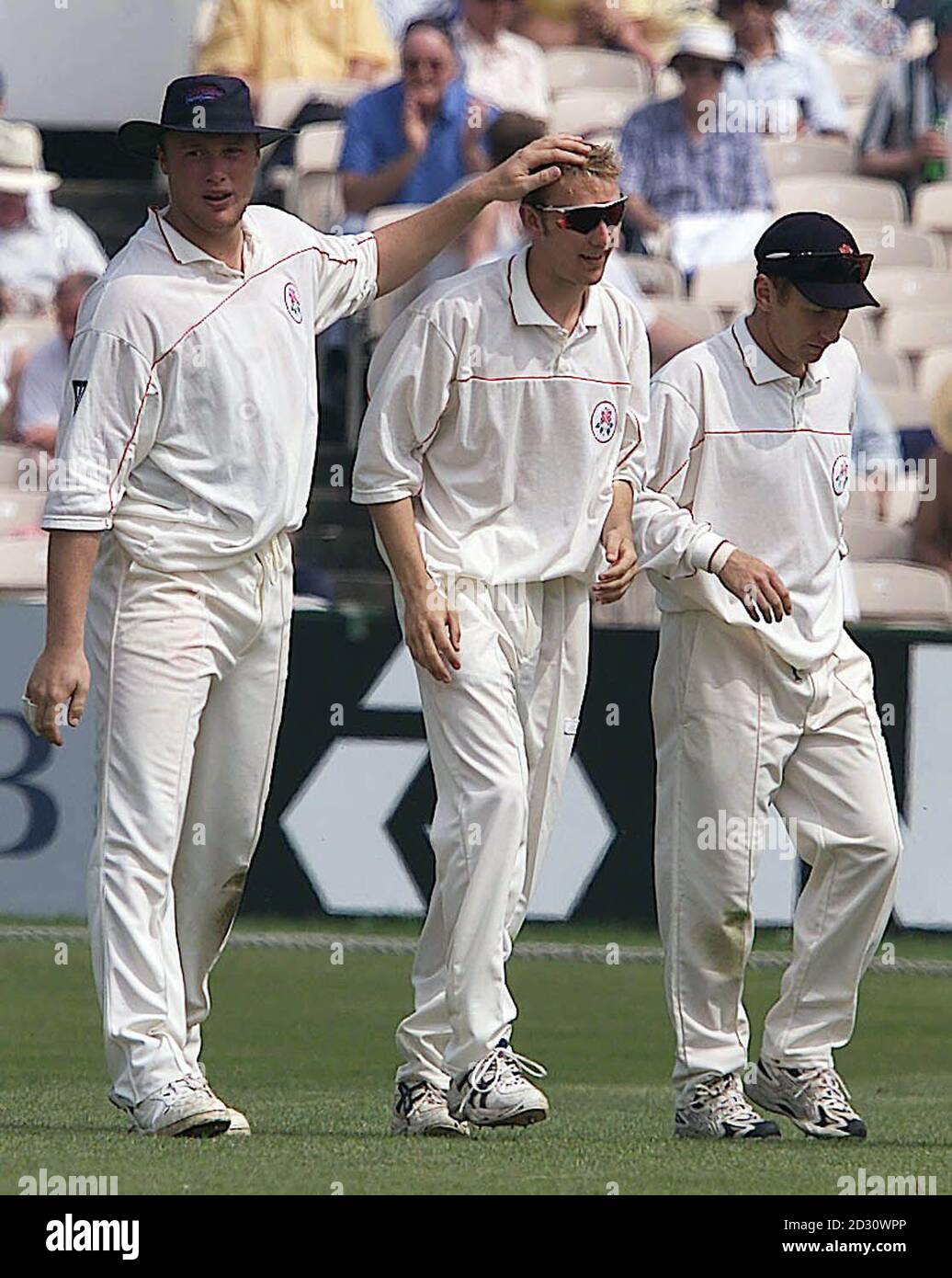 Lancashire leg spinner Chris Schofield gets a pat on the head from team ...