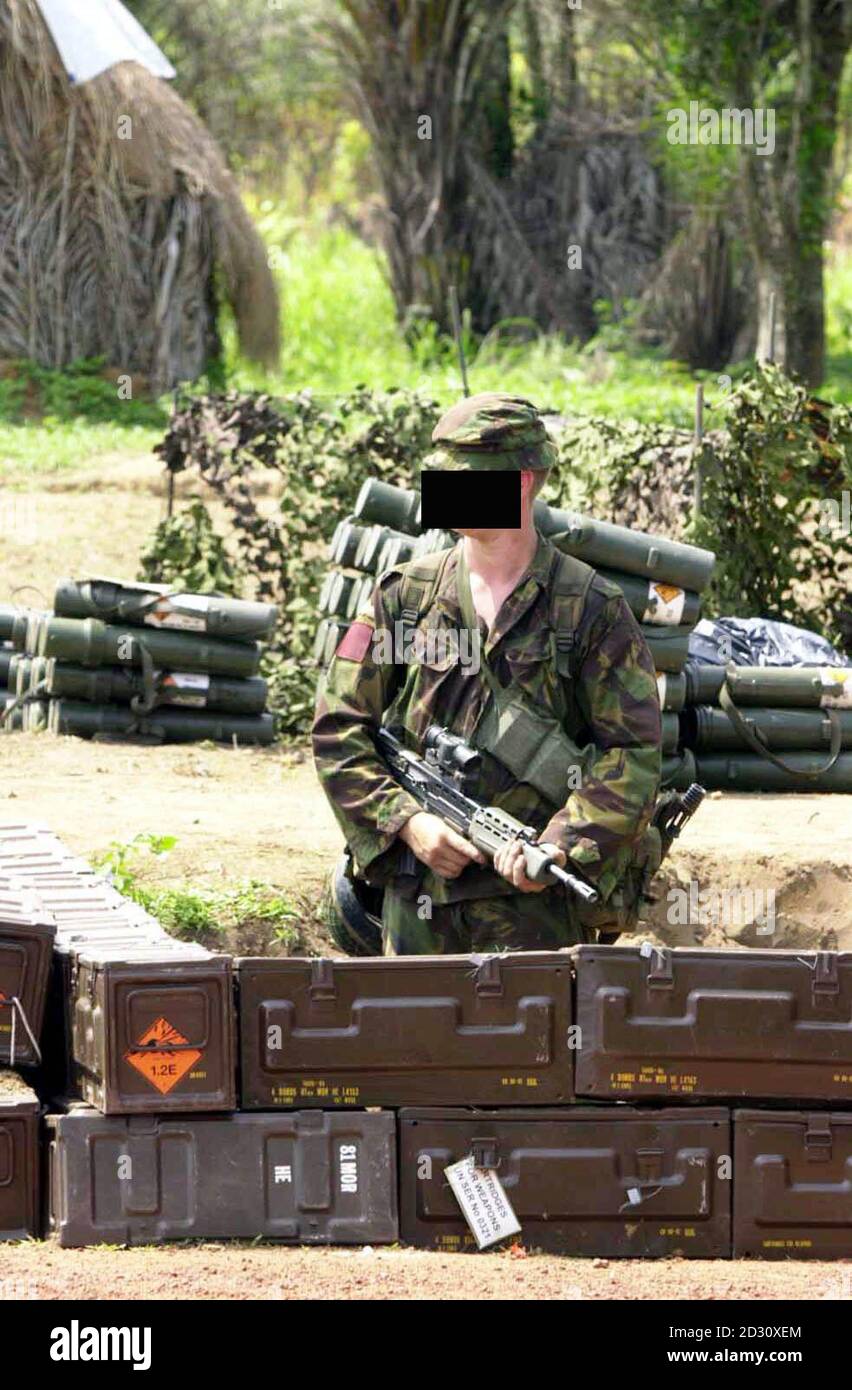 A Para Pathfinder guards the road to Lungi Loy where troops shot dead ...