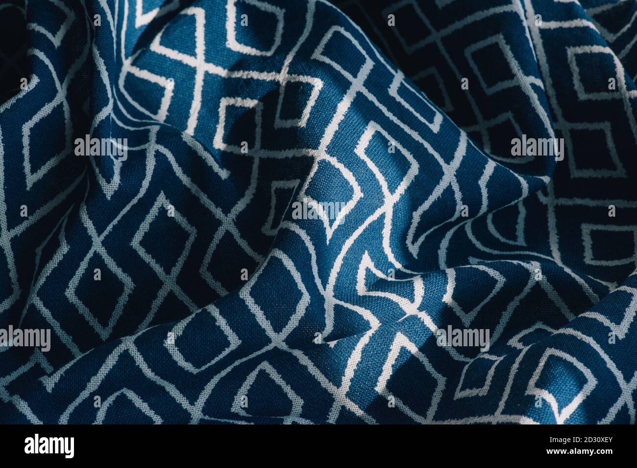 material textile background. Blue fabric in diamonds. Close-up of the ...