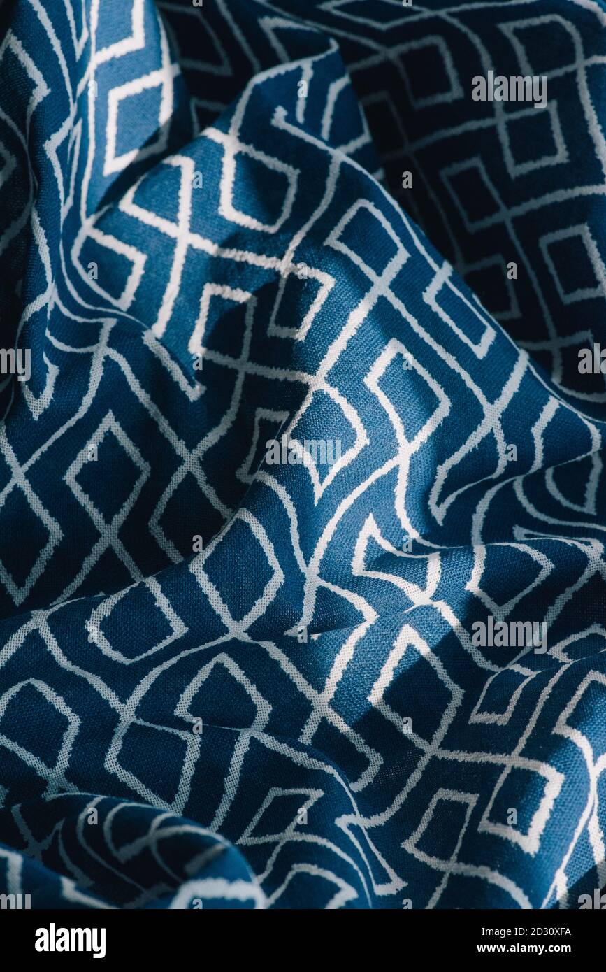 material textile background. Blue fabric in diamonds. Close-up of the ...