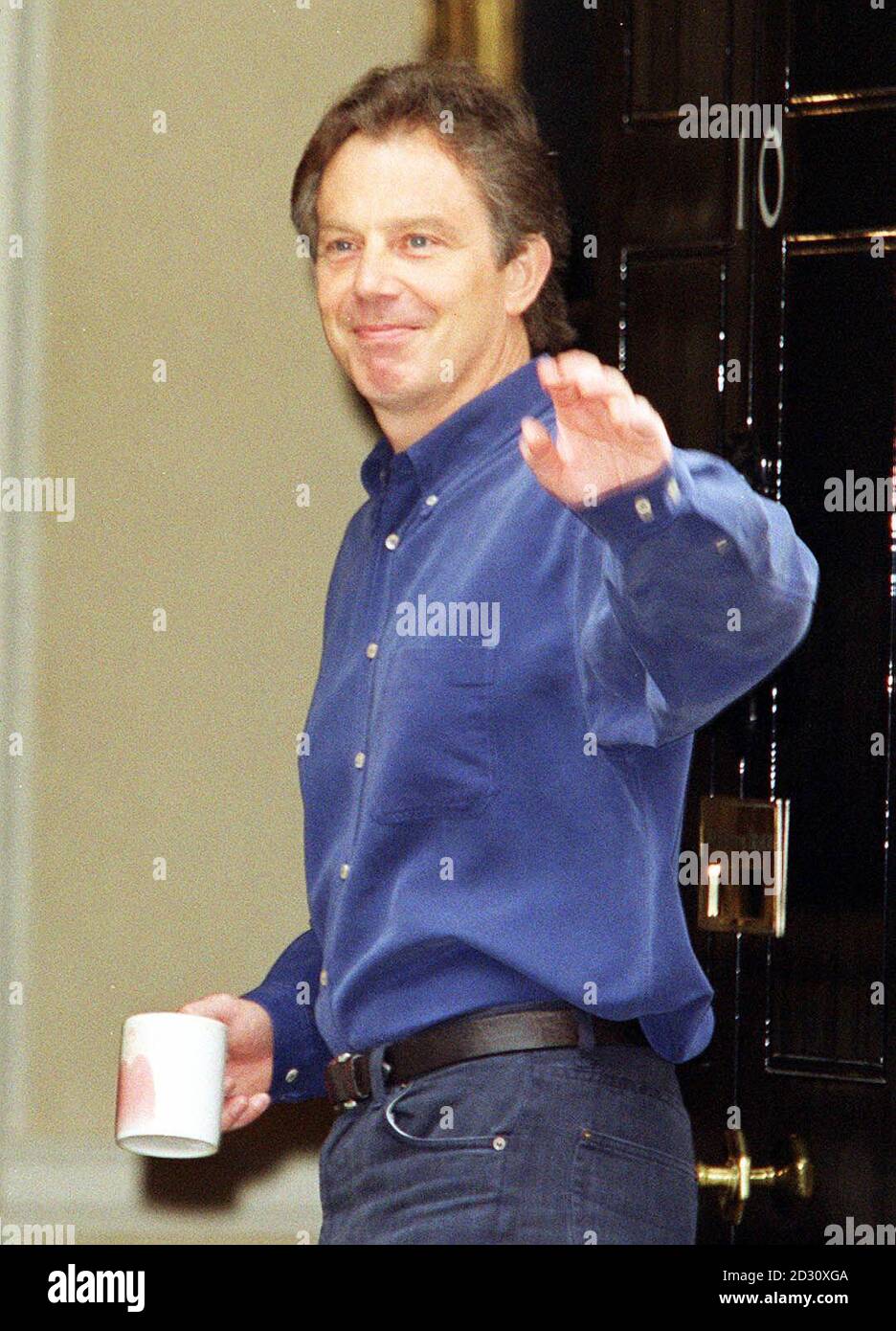 Prime Minister Tony Blair re-enters No:10 Downing Street, after coming ...