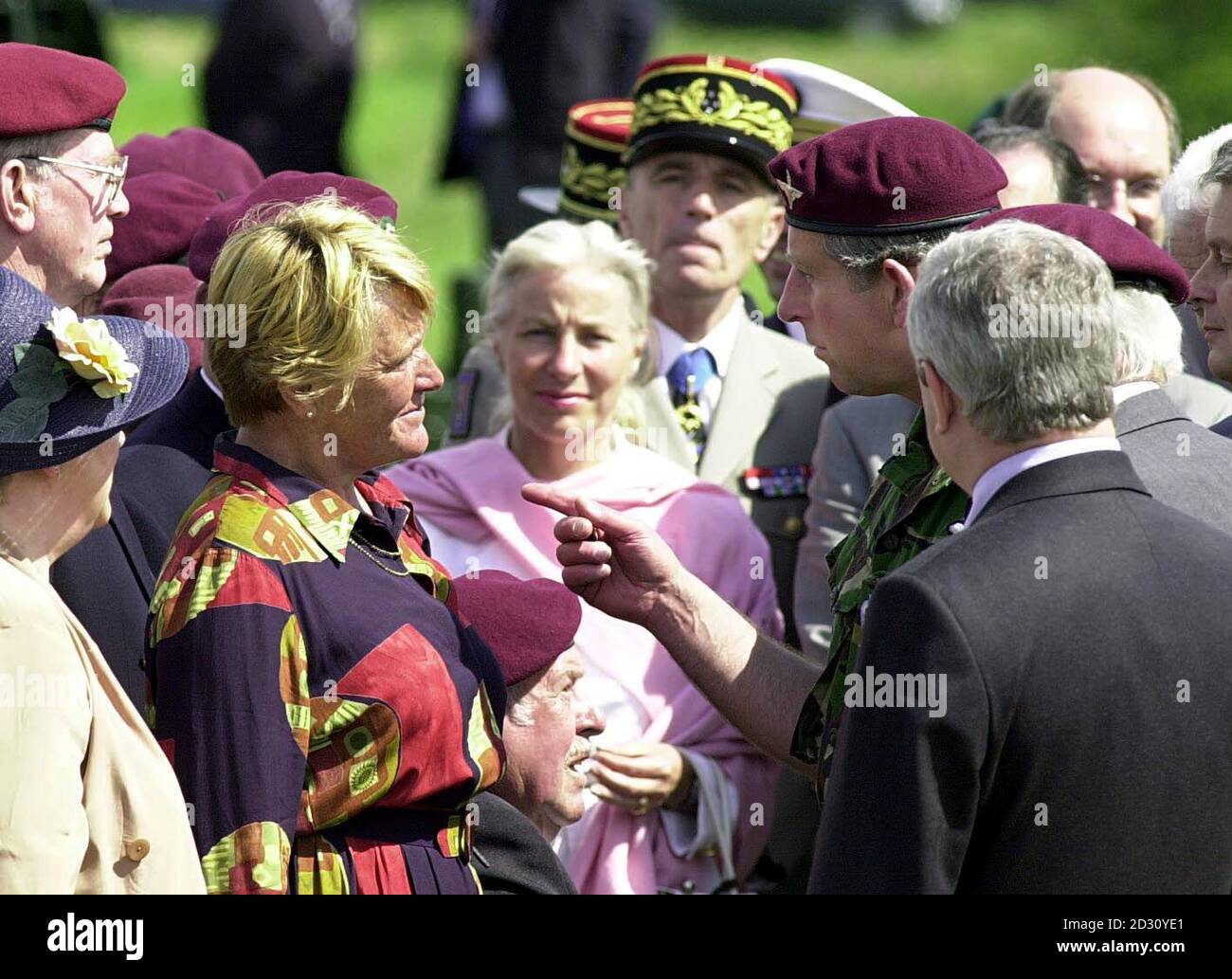 The Prince of Wales talks to Miss Margaret Brotheridge, whoose father ...