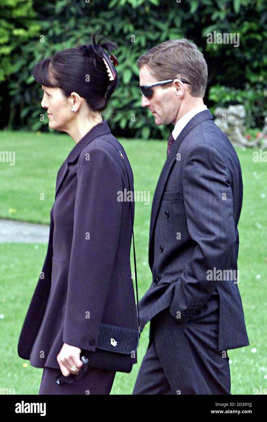 Jockey Ray Cochrane and his wife arrives at the funeral service of ...