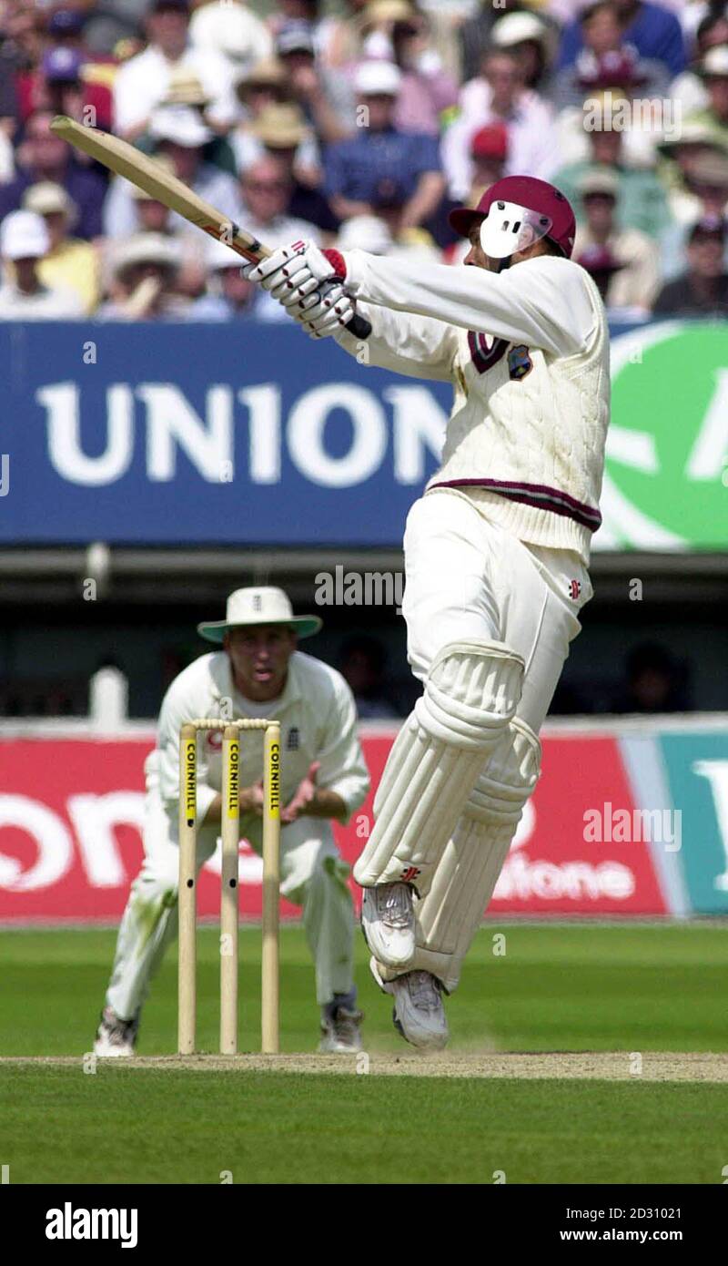 West Indies captain Jimmy Adams hooks a ball from England's Ed Giddins ...