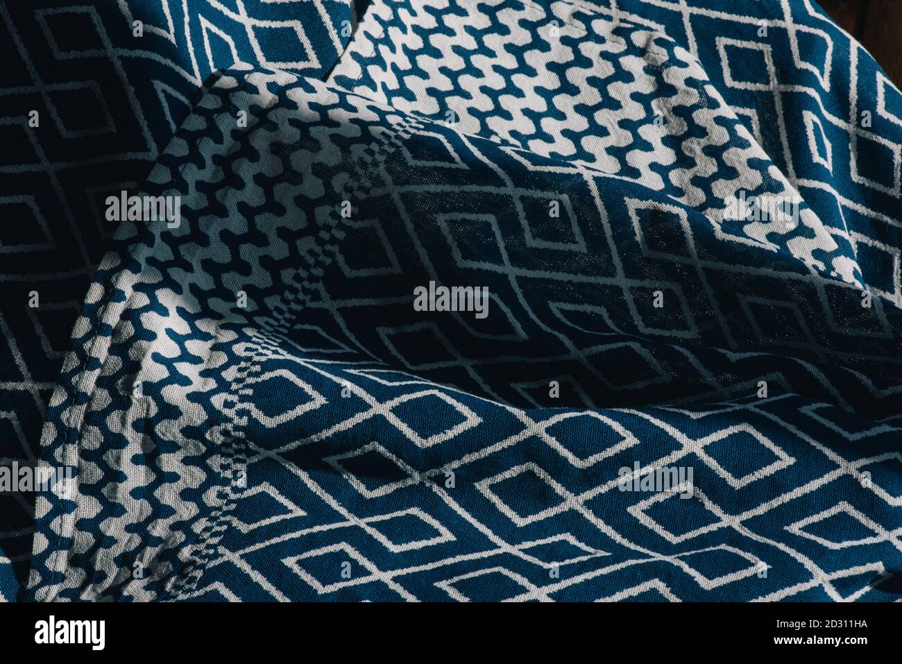 material textile background. Blue fabric in diamonds. Close-up of the ...