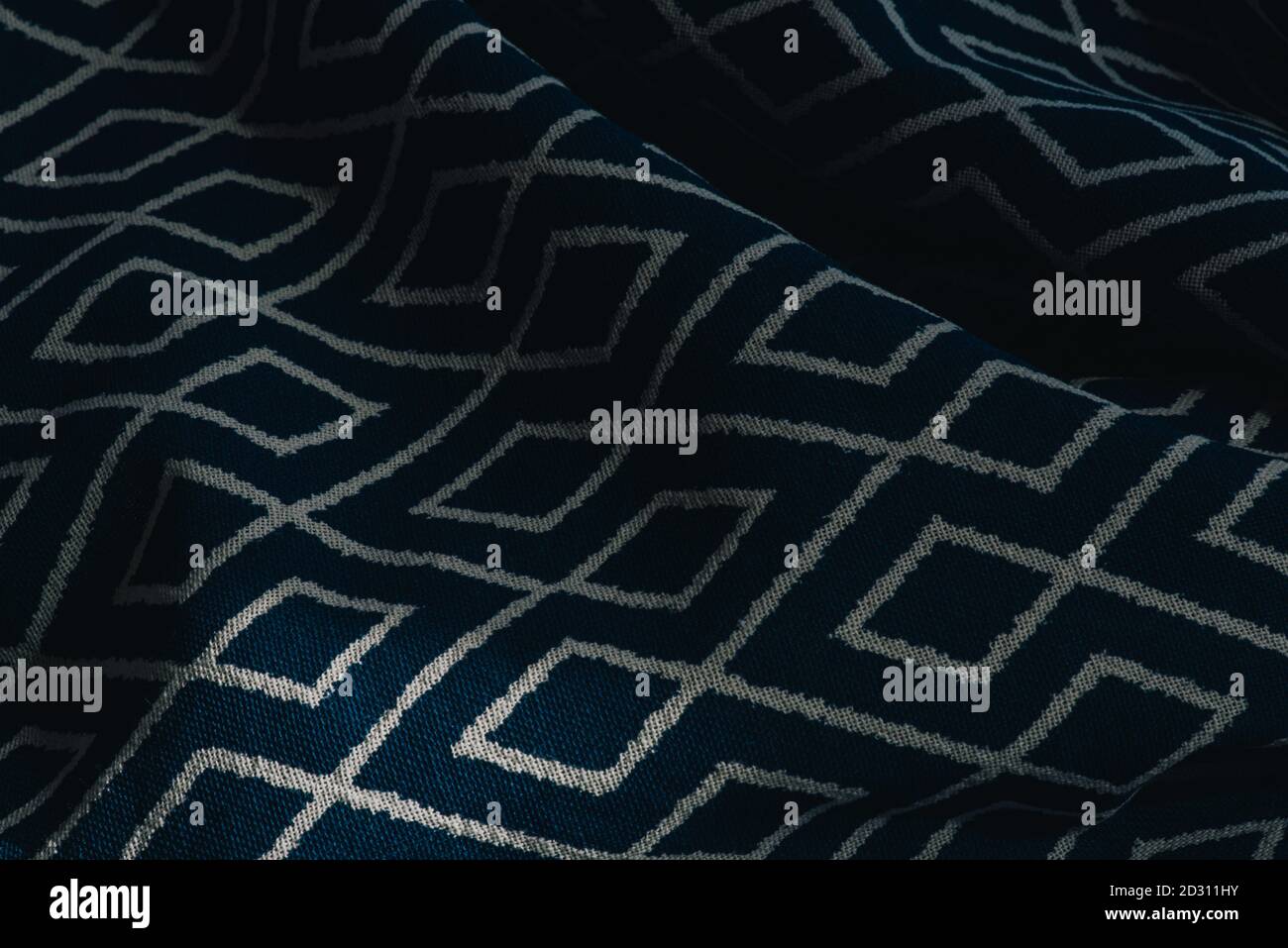 material textile background. Blue fabric in diamonds. Close-up of the ...