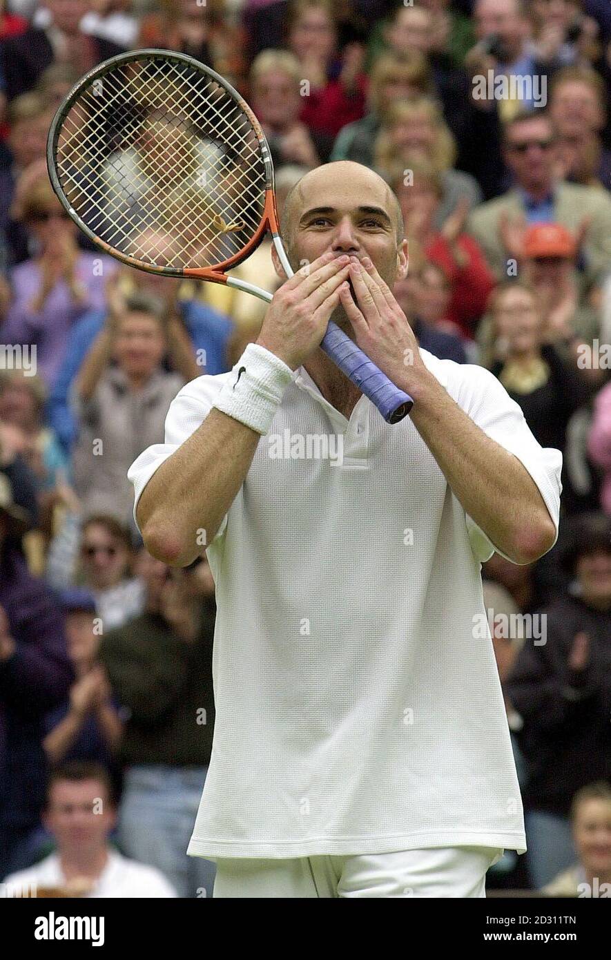 NO COMMERCIAL USE: NO COMMERCIAL USE: America's Andre Agassi celebrates ...
