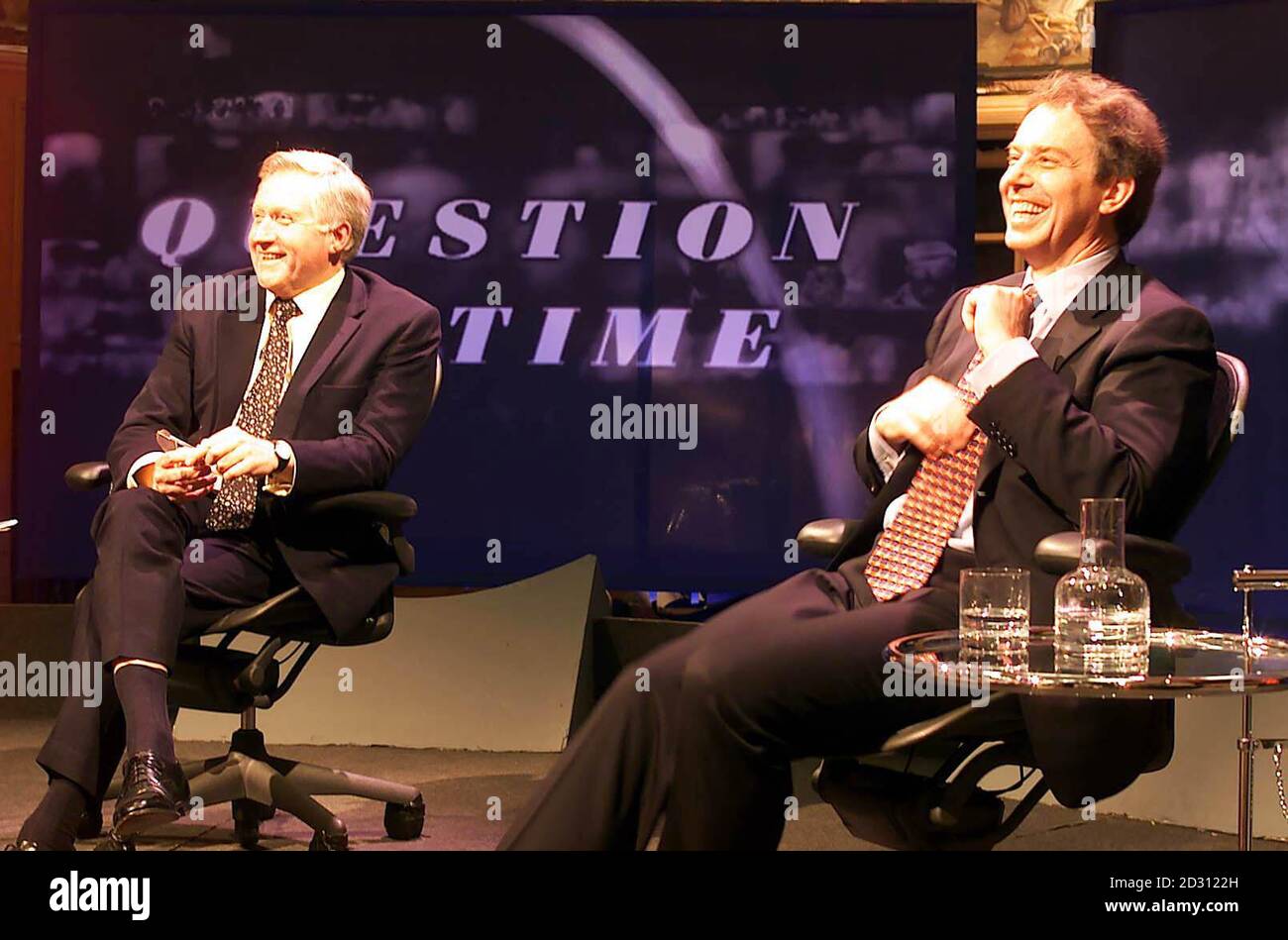 Prime Minister Tony Blair (R) and TV presenter David Dimbleby relax ...