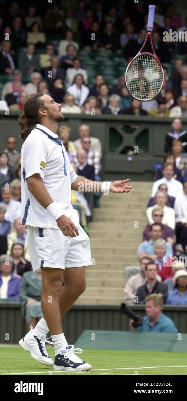 Australia's Pat Rafter tosses his racket into the air during the semi ...