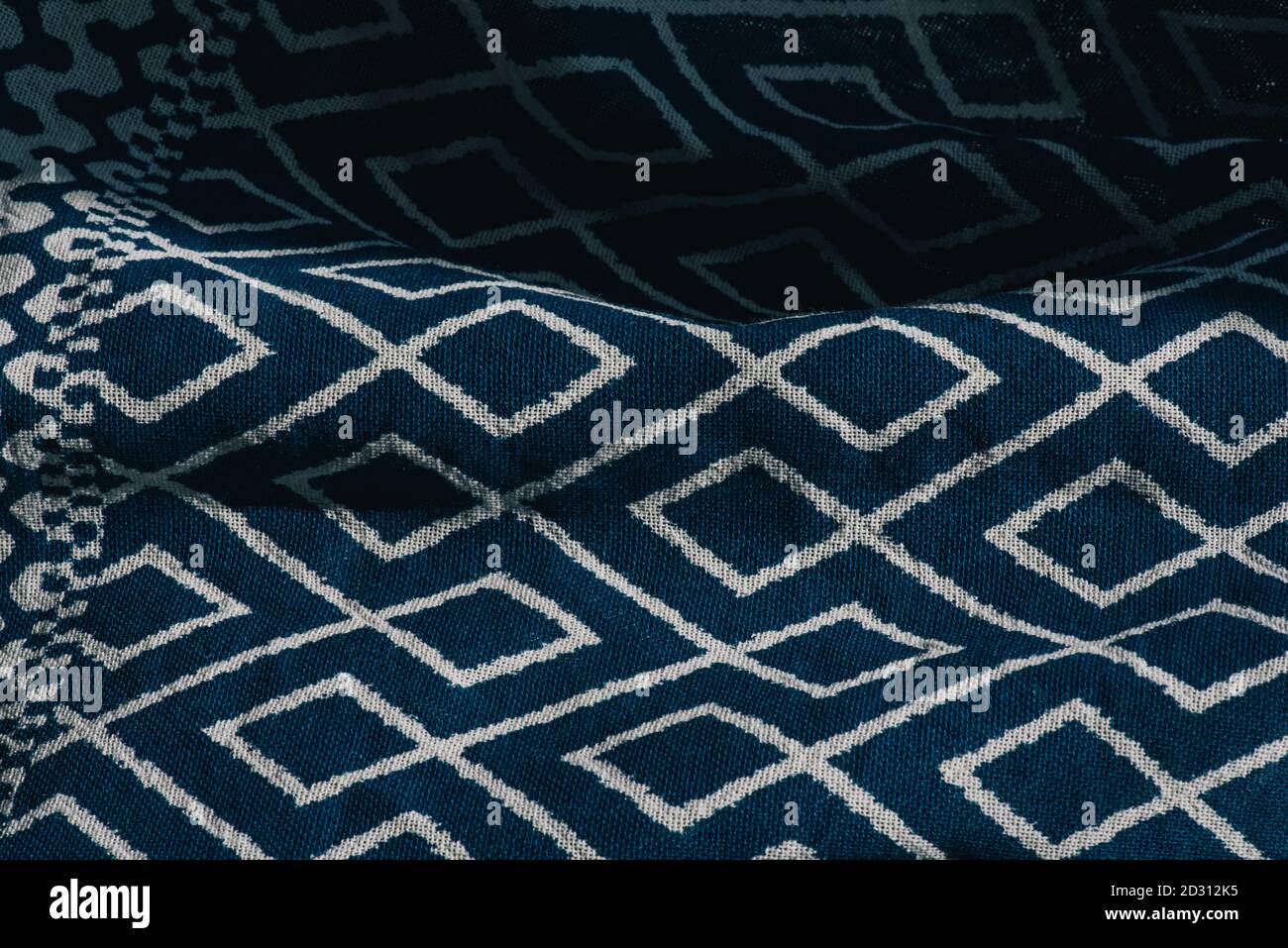 material textile background. Blue fabric in diamonds. Close-up of the ...