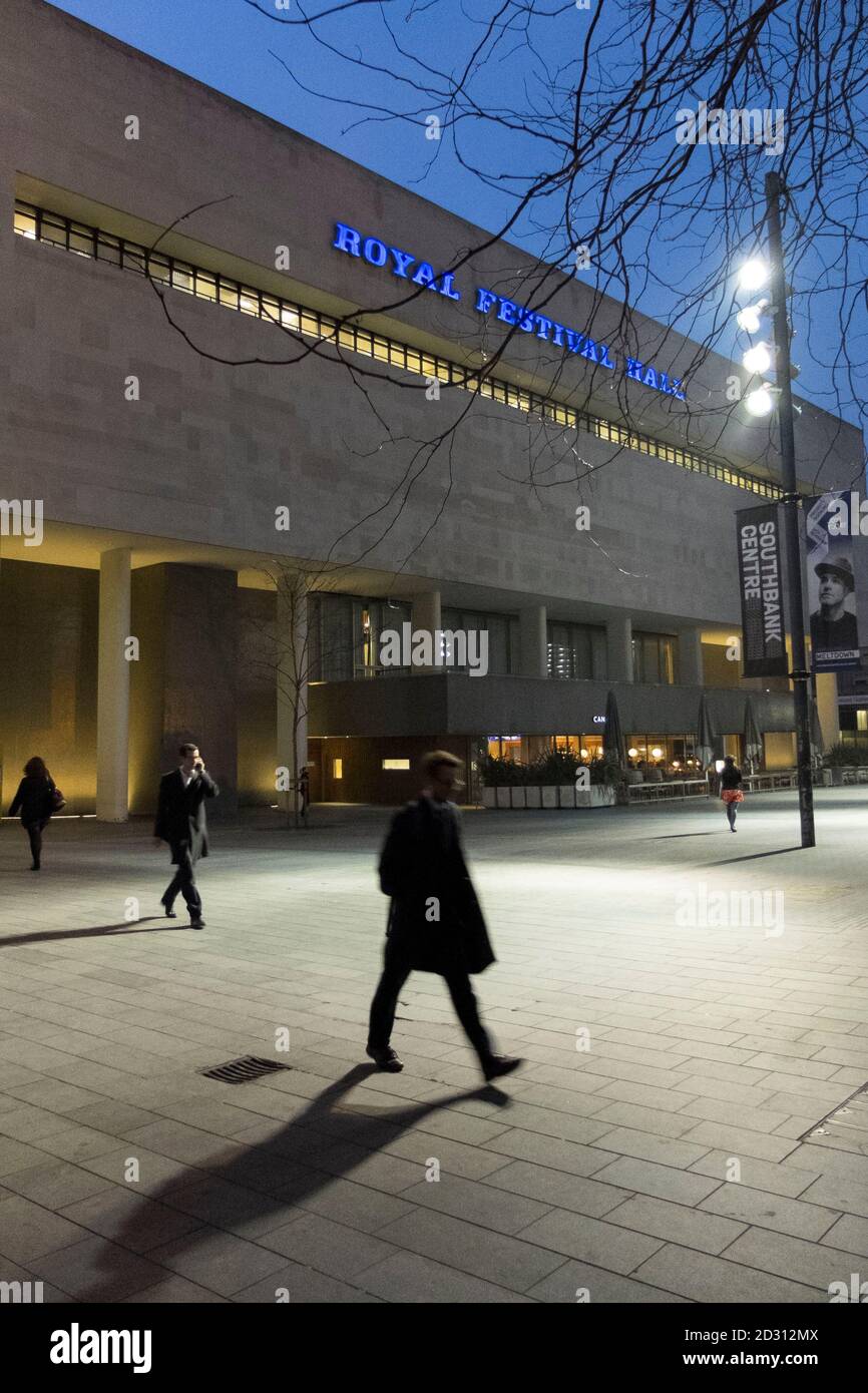 Commuters head for Waterloo Station across the concourse behind The ...