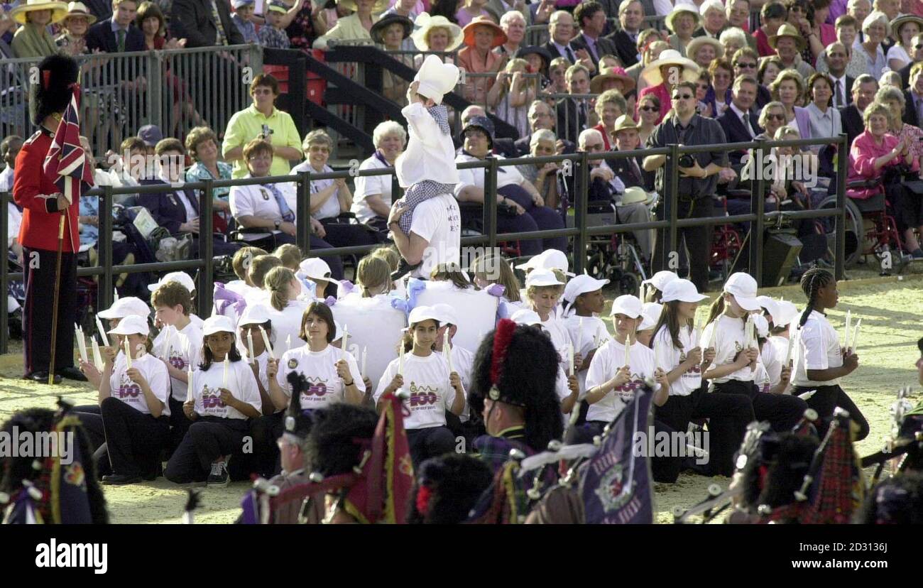 A birthday cake of children during the pageant celebrating the Queen ...