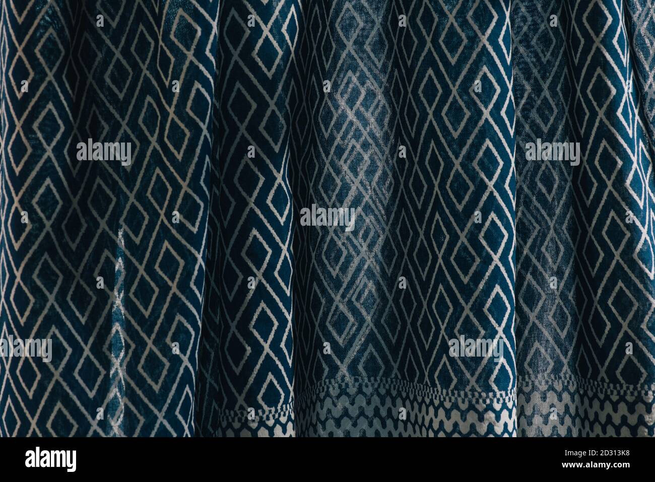 material textile background. Blue fabric in diamonds. Close-up of the ...
