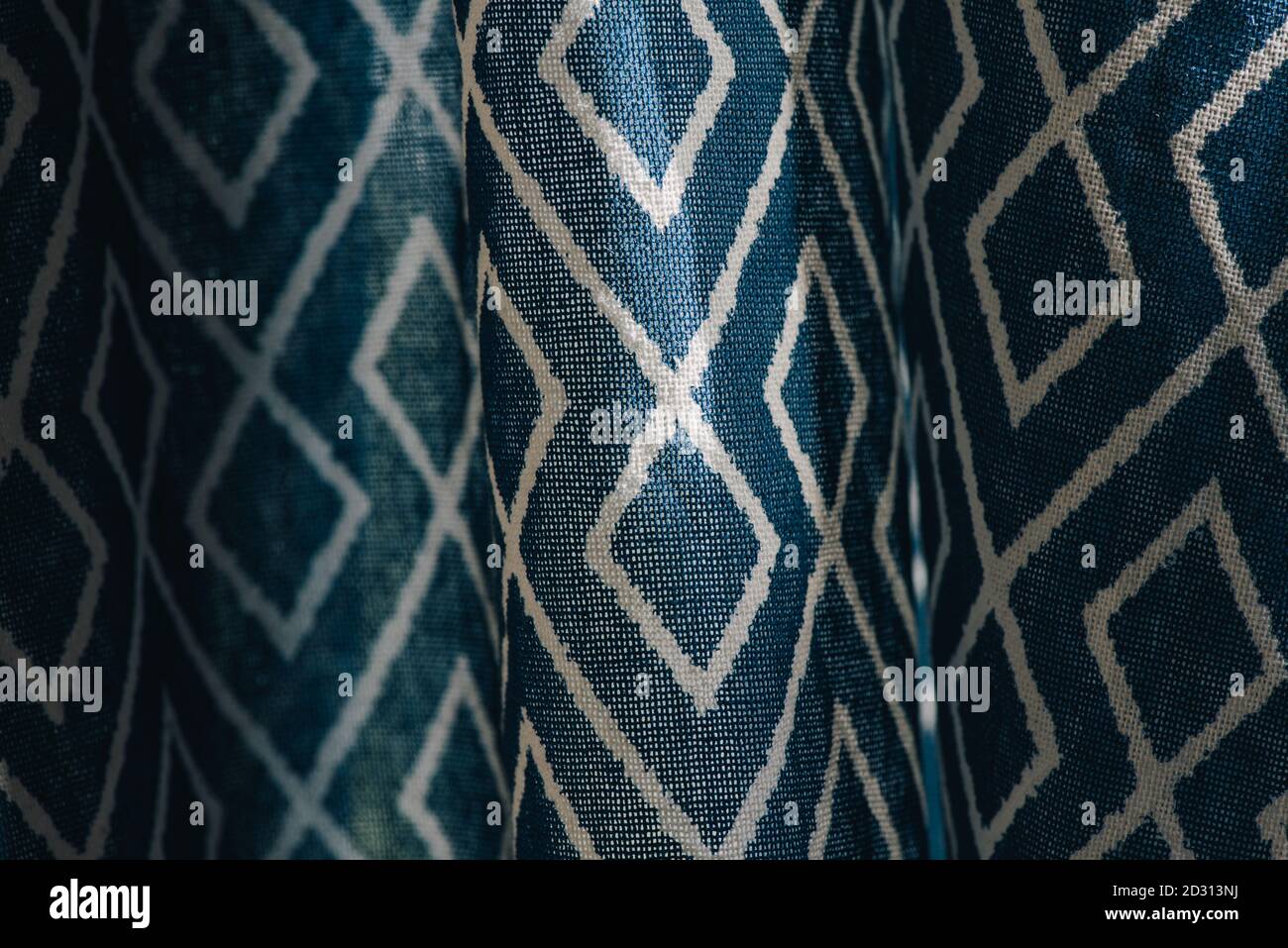 material textile background. Blue fabric in diamonds. Close-up of the ...