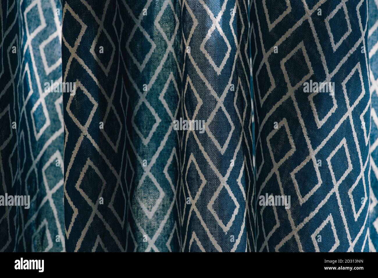 material textile background. Blue fabric in diamonds. Close-up of the ...