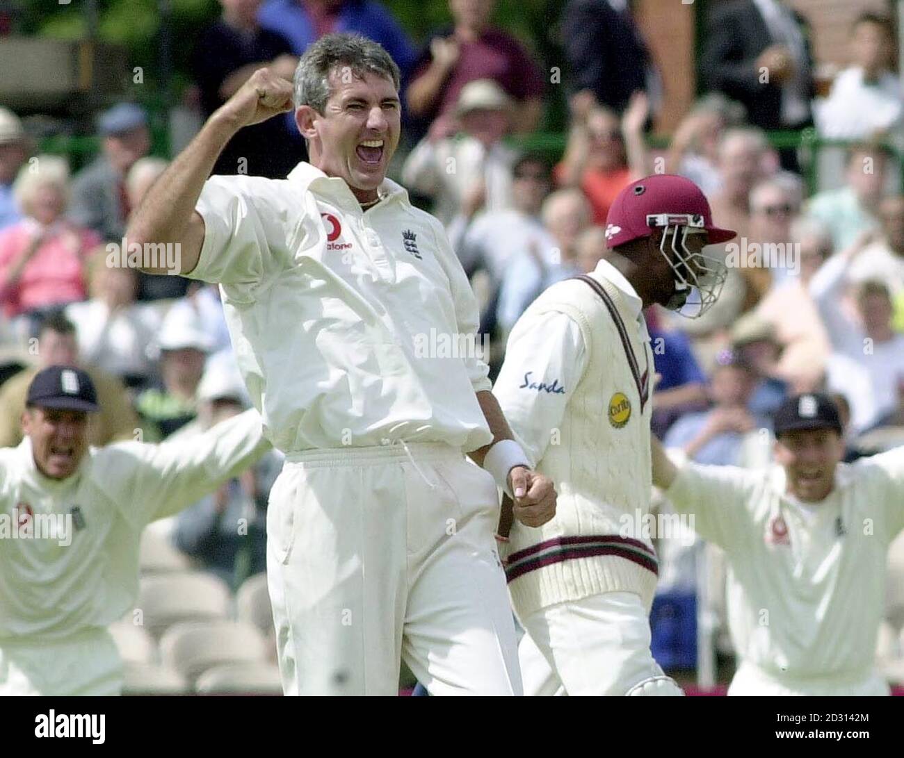 England's Andy Caddick celebrates the wicket of West Indies batsman ...