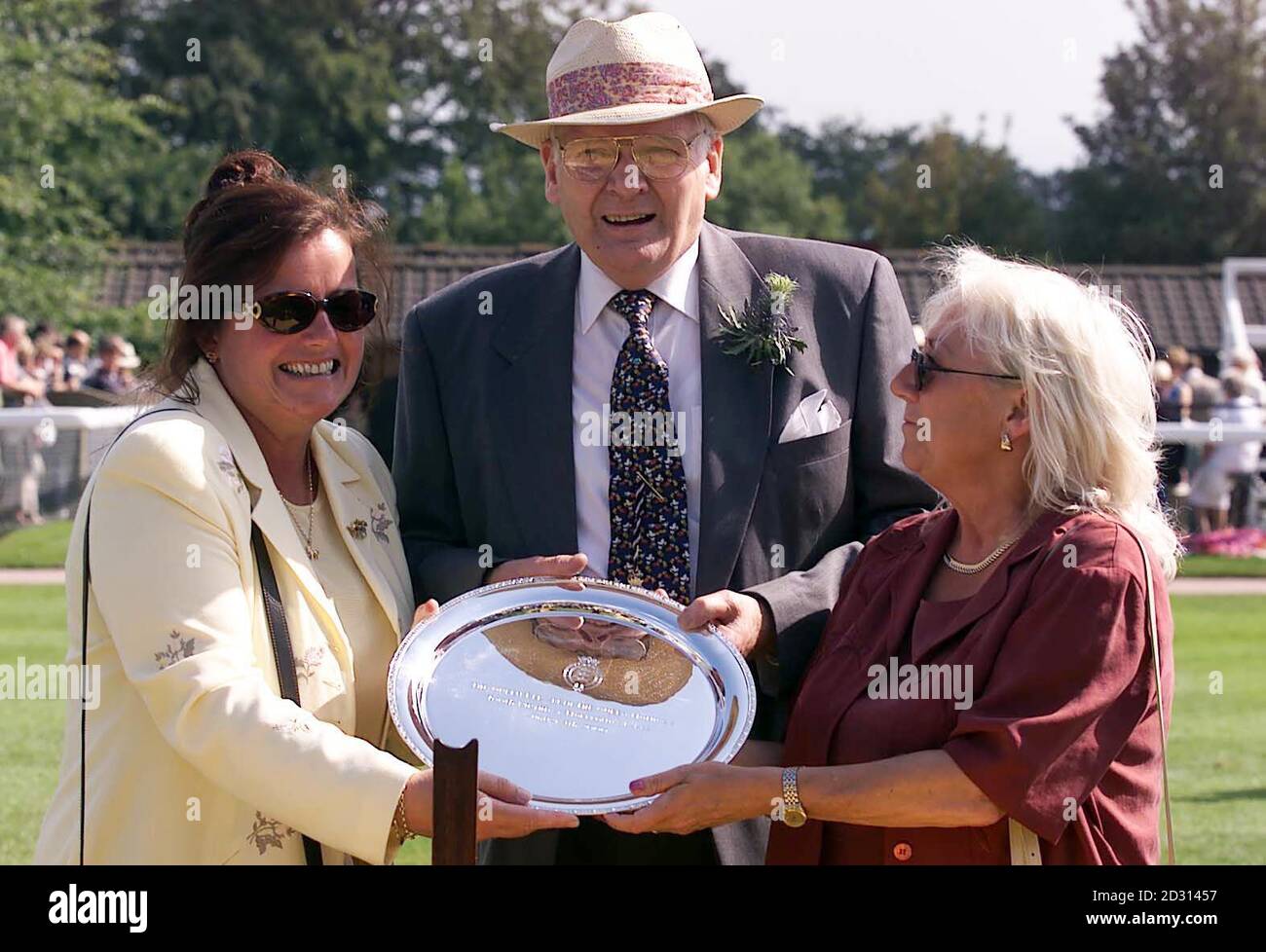 The Queen Mother's chef Michael Sealey (C) presents the owner Jan ...