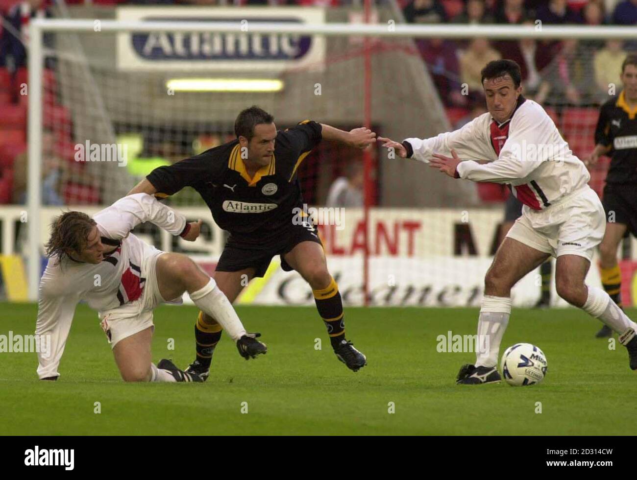 Aberdeen`s Robbie Winters (centre) holds off Dublin`s Bohemian`s Simon ...