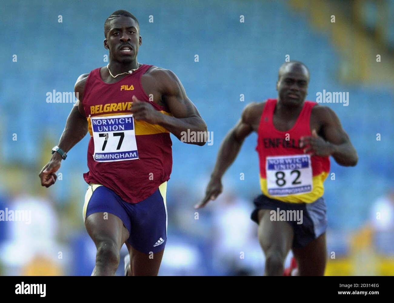 Sprinter Dwain Chambers (left) leads during the100m heats of the ...