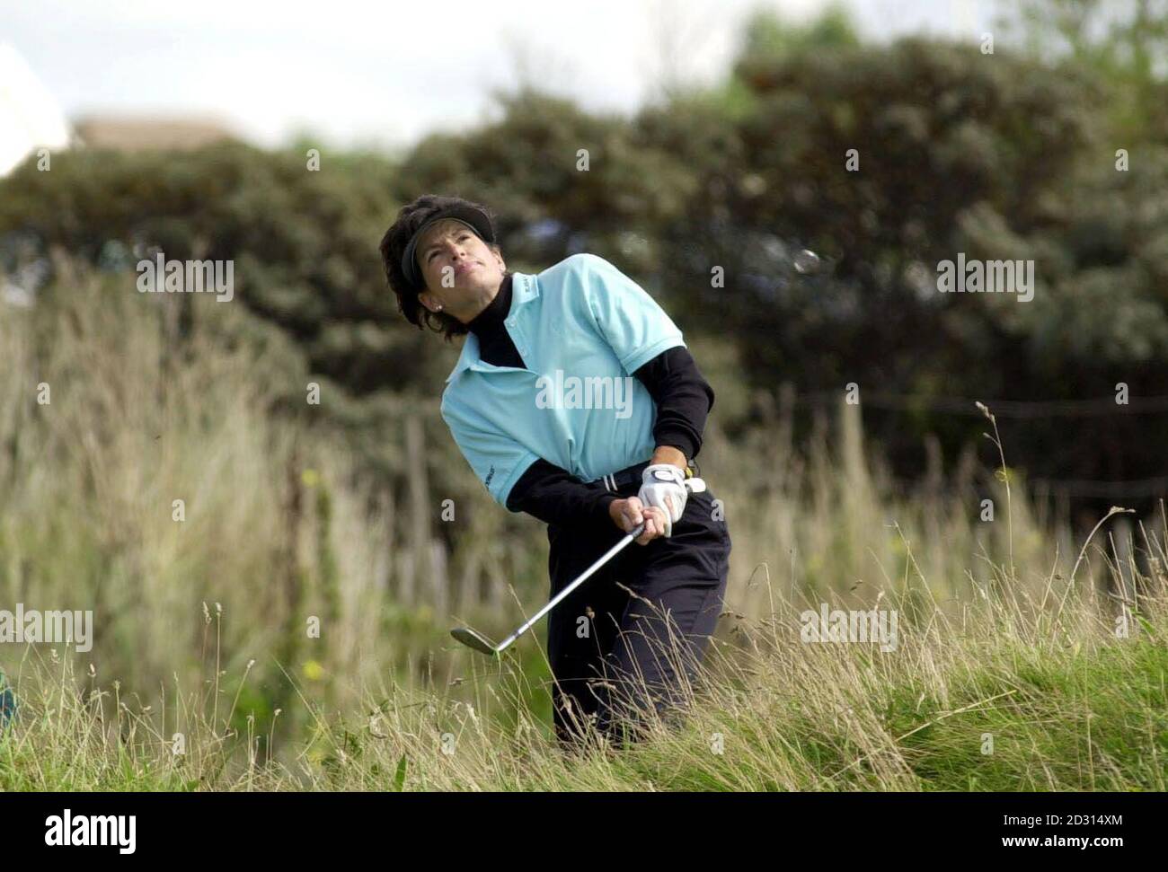Juli Inkster chips from the rough at the fourth hole, during the ...