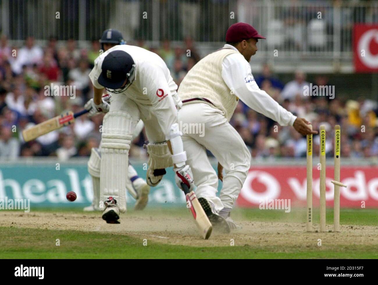 West Indies captain Jimmy Adams attempts to run out England batsman ...