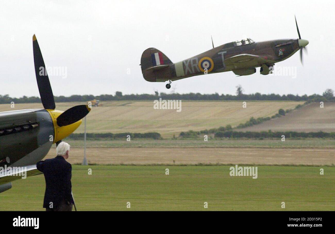 Ex-Battle of Britain fighter pilot, Tom Neil, watches a Hurricane takes ...