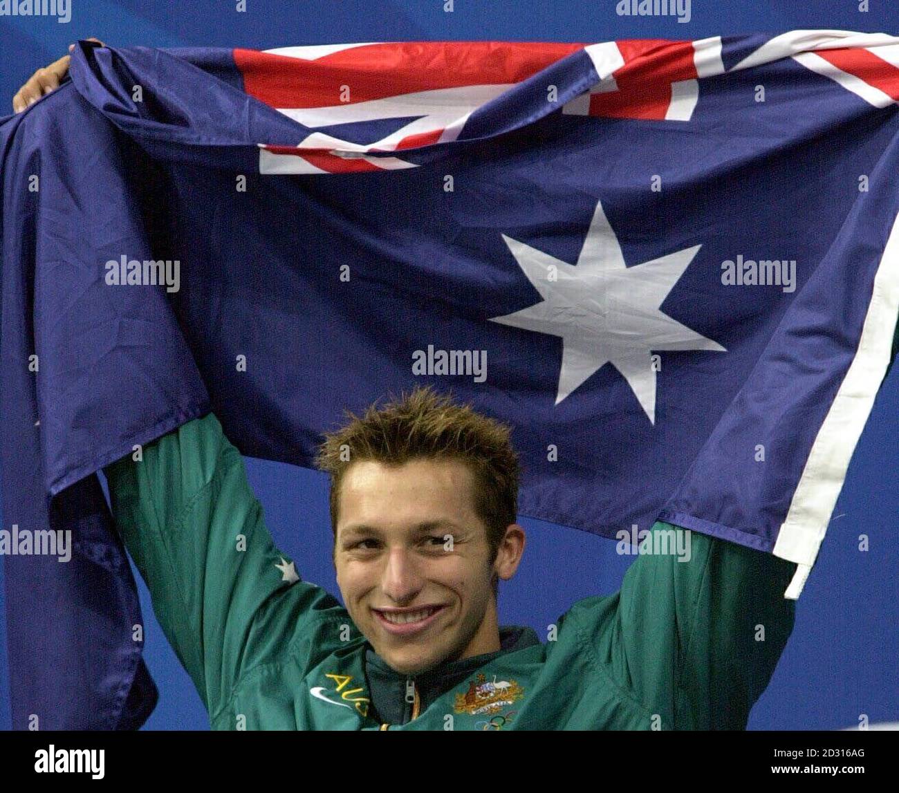 Australia swimmer Ian Thorpe celebrates winning a gold medal in 400m ...