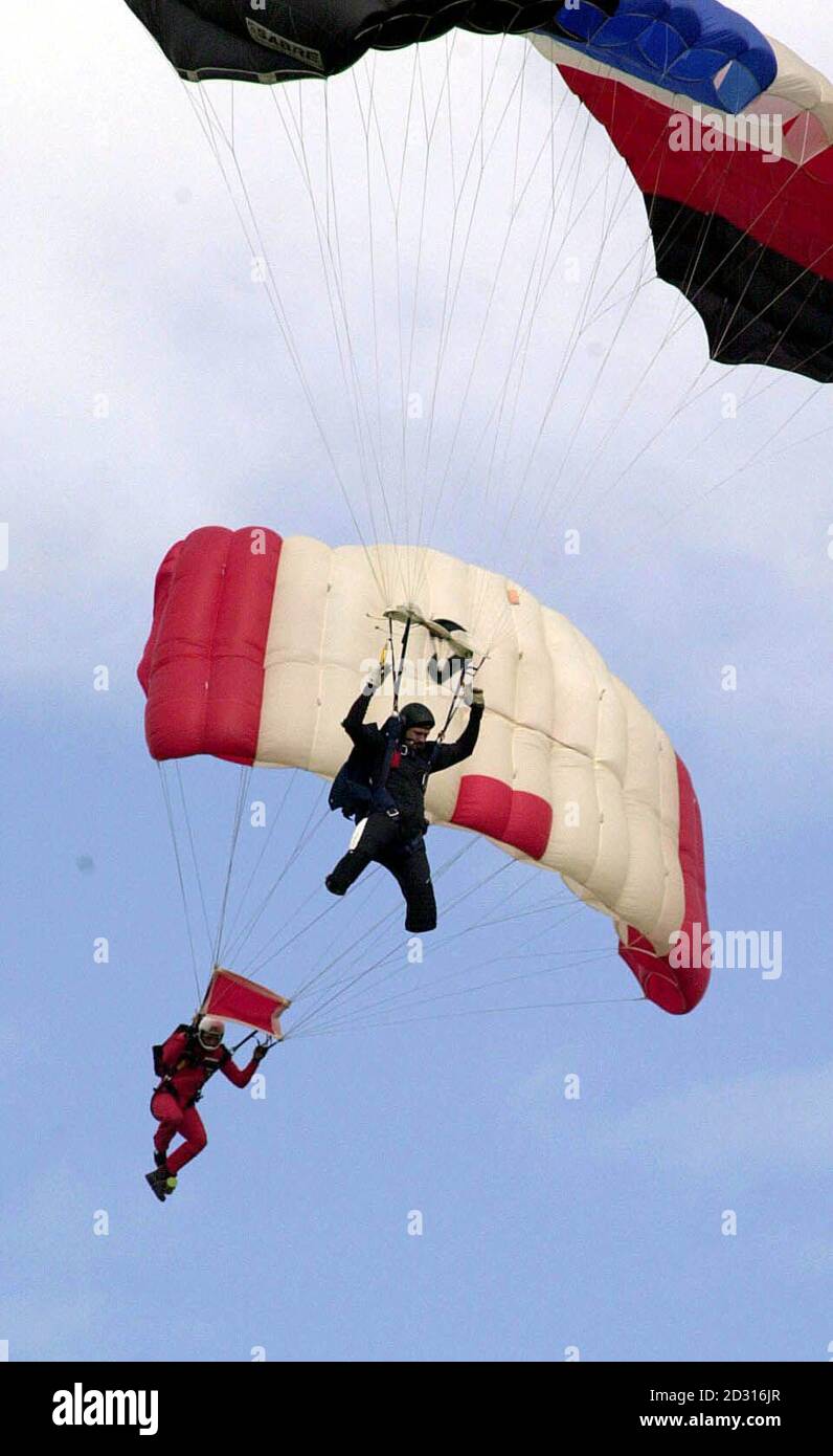 Double amputee Alastair Hodgson (foreground) completes a freefall jump ...