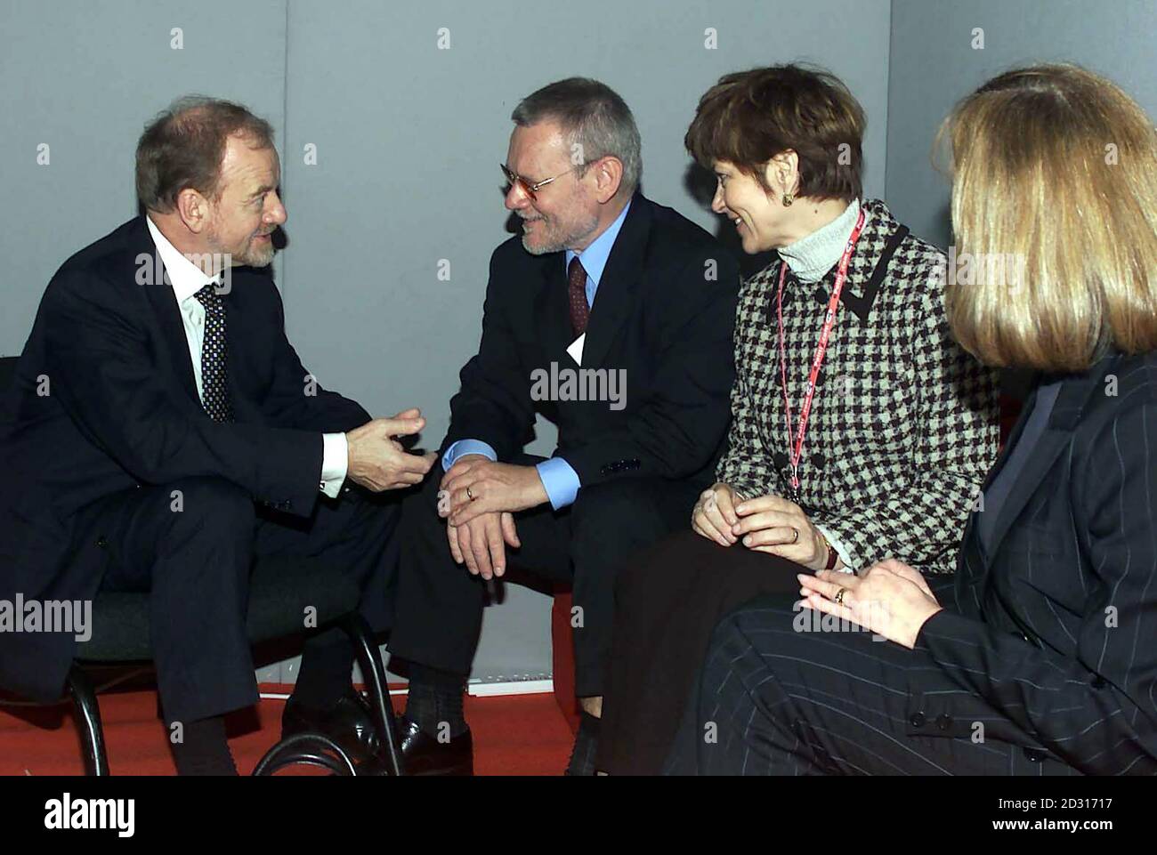 Foreign Secretary Robin Cook (left) and his wife Gaynor (right) chat ...