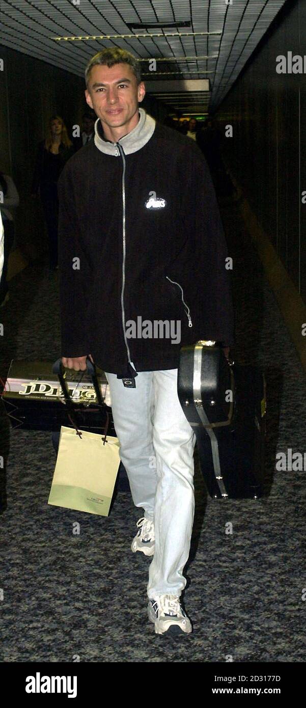 Triple-jump gold medal winner Jonathan Edwards at Heathrow Airport on ...