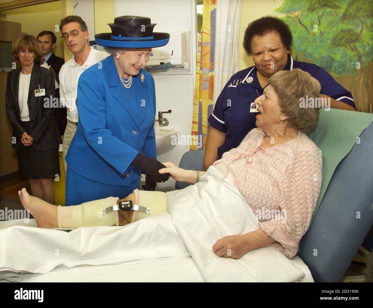 The Queen meets patient Freda Zacharak, during a visit to Homerton ...