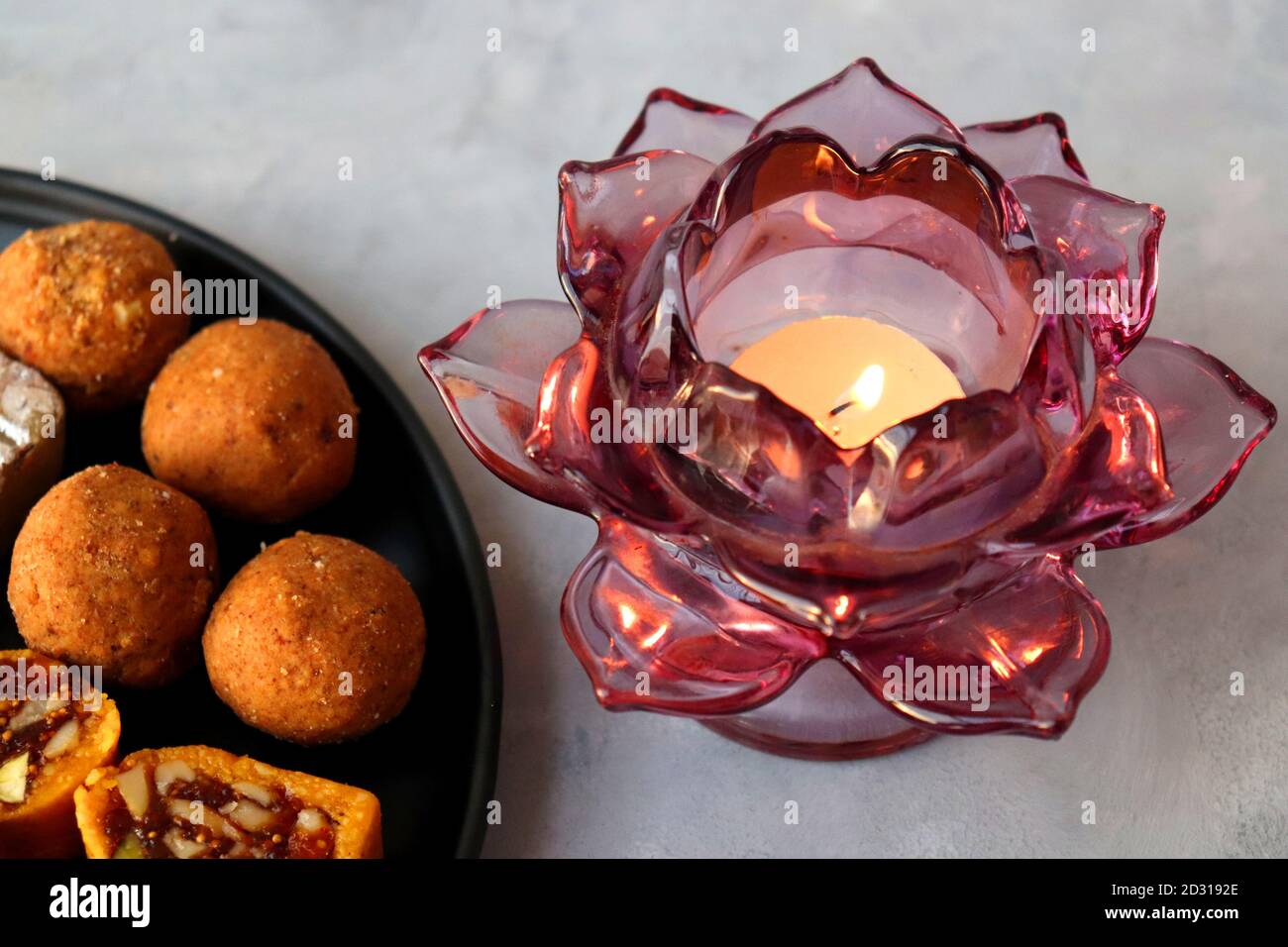 Assorted Indian sweets or Mithai, Rava laddoo, Besan laddu, dry fruits ...