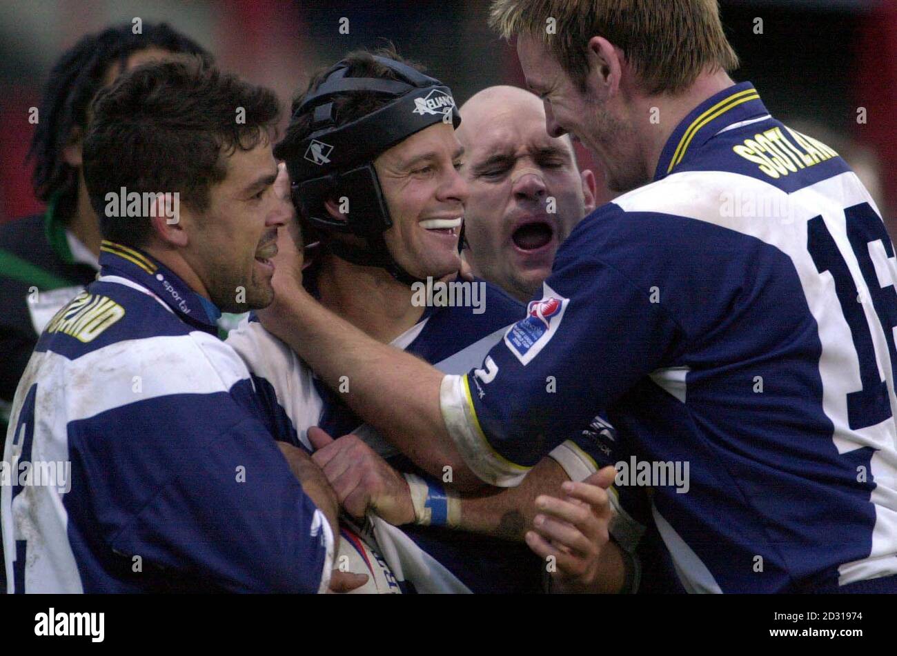 Scotland's Geoff Bell (2nd left) celebrates a try in the last minutes ...