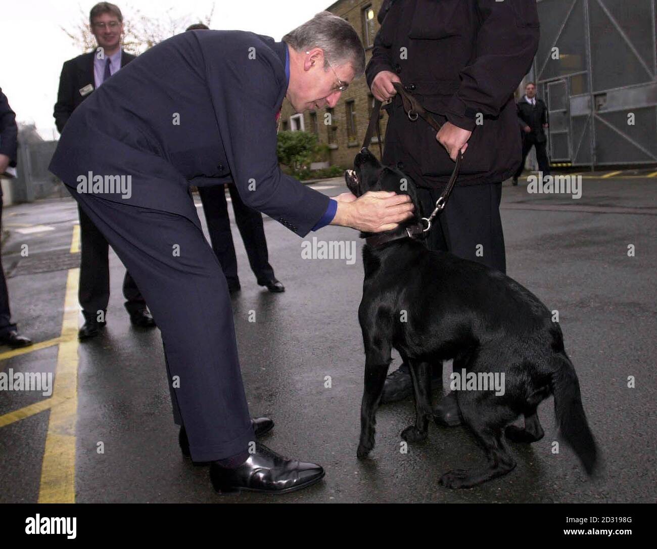 Home Secretary Jack Straw (left) is met by Passive Search Dog, Molly ...