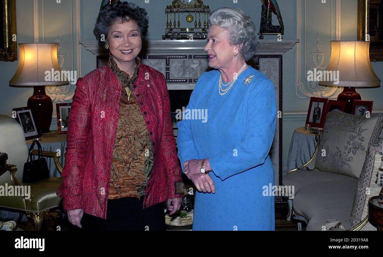 Britain's Queen Elizabeth II (right) receives Her Excellency the Right ...