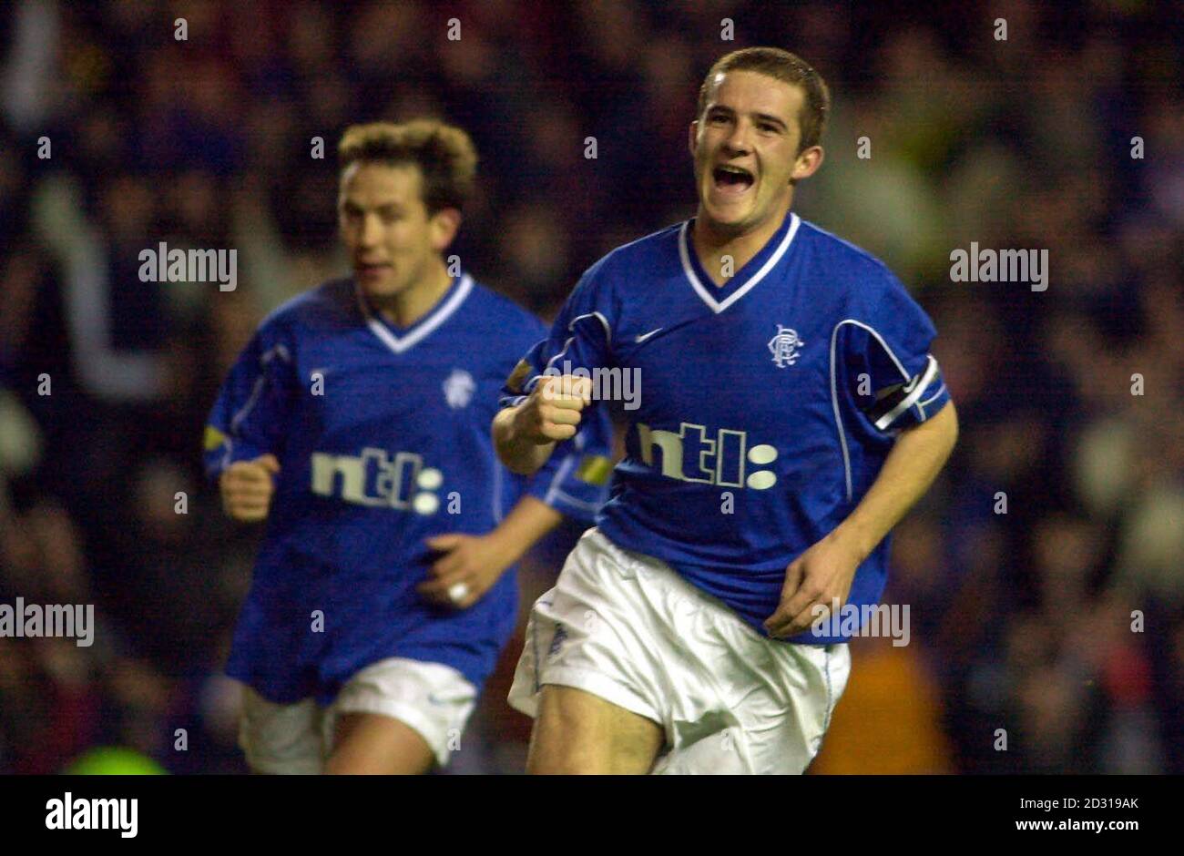 New Rangers' Captain Barry Ferguson celebrates after scoring during ...