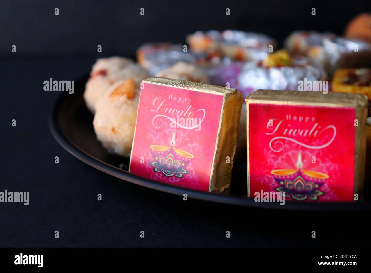 Assorted Indian sweets or Mithai, Rava laddoo, Besan laddu, dry fruits ...